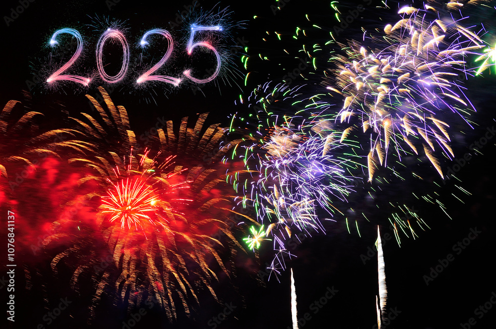 Sparkler 2025. Firework illumination on dark sky background, happy new ...