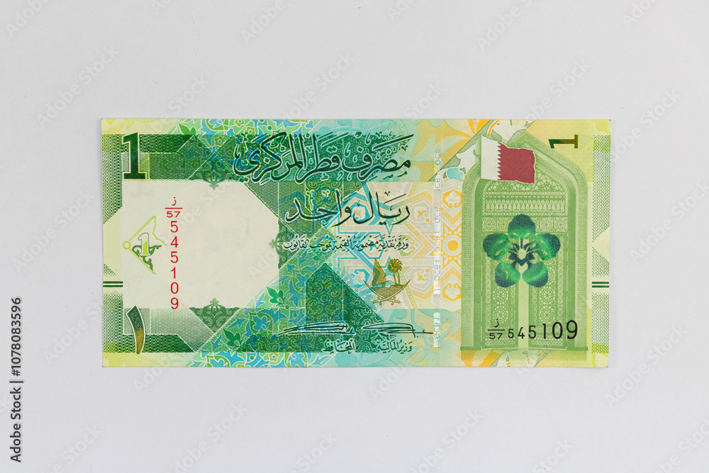 Qatar 1 riyal banknote with traditional geometric patterns, flag of ...