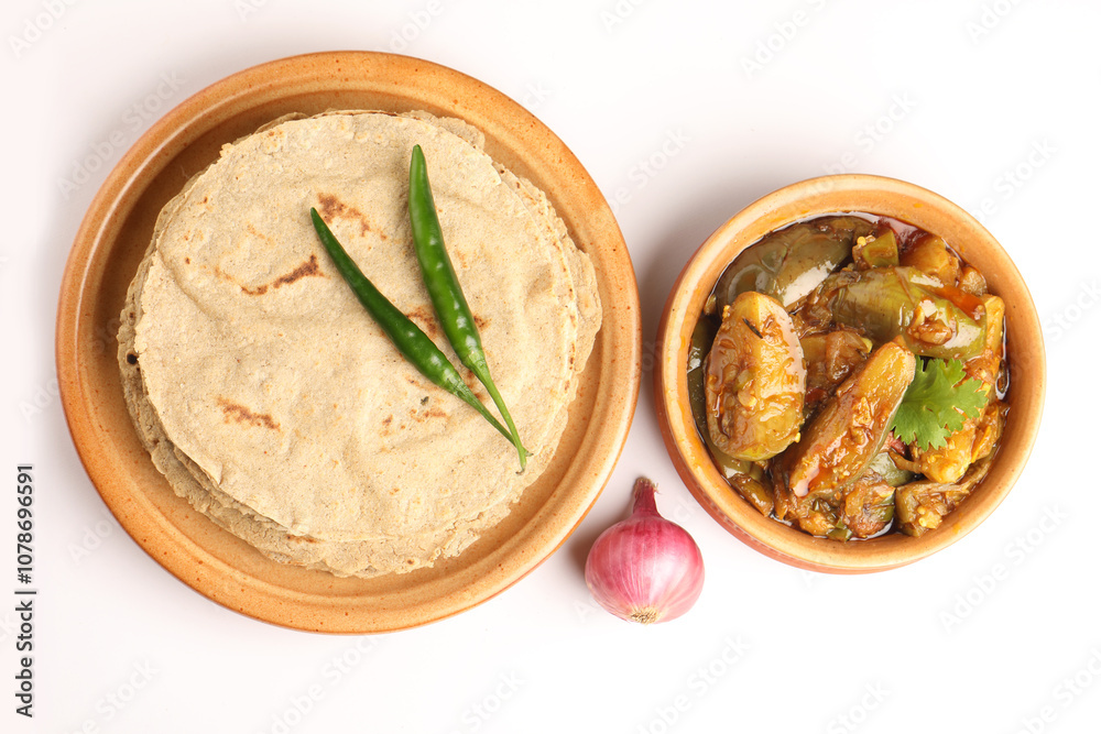 Jowar Roti or Jowar Bhakri with brinjal curry , a staple food in the ...