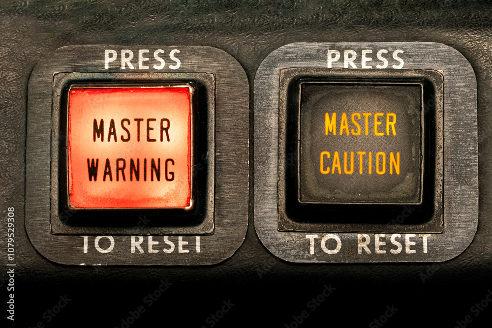 Master Warning, Master Caution. Warning lights in the flight deck on an ...