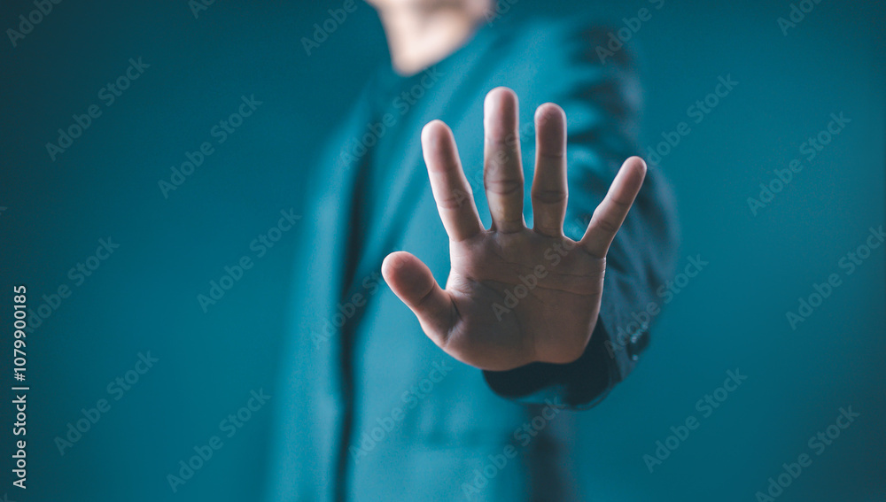 person's hand showing palm gestures stop, concept violence, warning ...