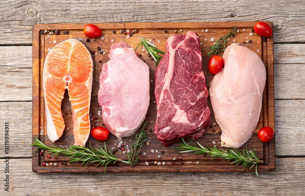 Mix of raw meat and fish . Salmon , beef , pork , chicken staek . Top ...