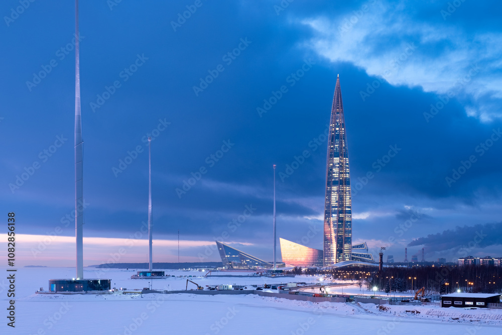 Skyscraper Lahta center on the shore of the Gulf of Finland at sunset ...