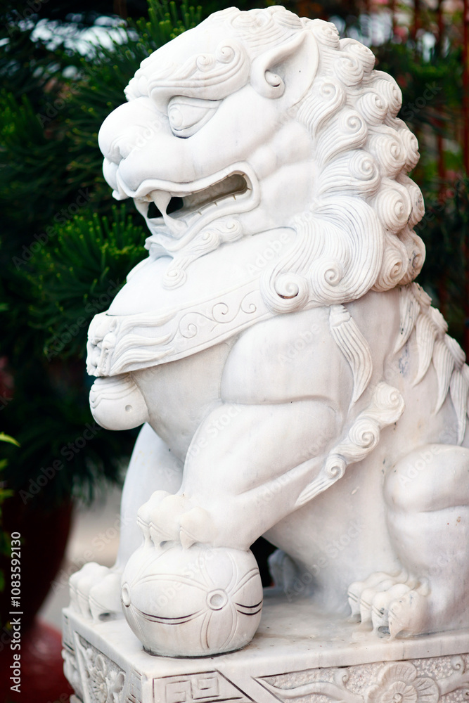 Guardian. Chinese lion statue represent Yang force, male, positive ...