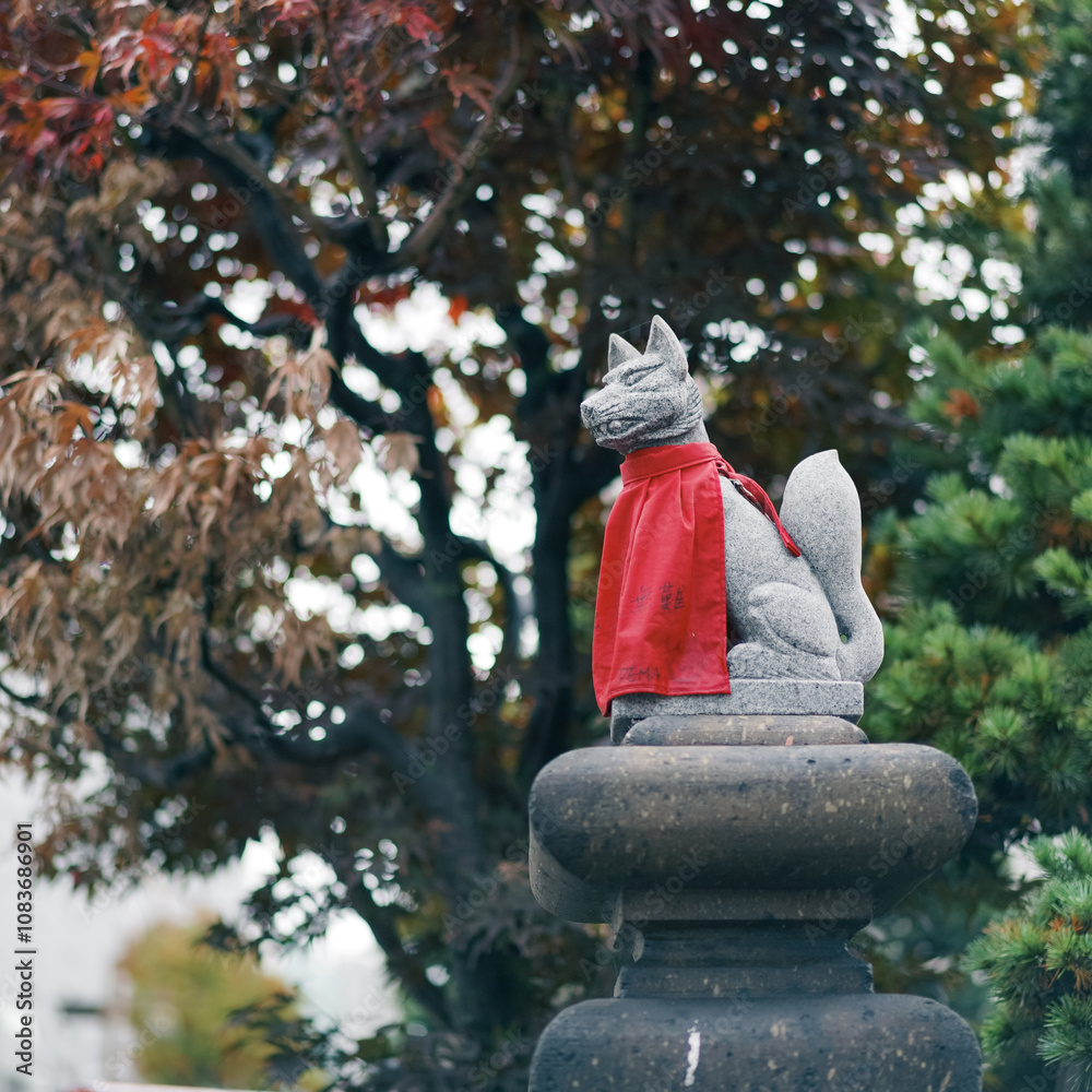 Fox status. A closed up details of fox status sitting in front of the ...