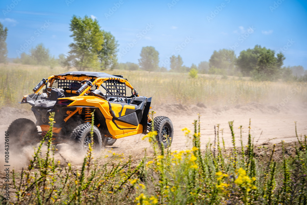 Outdoor activities UTV buggy moves on dusty road. 4x4, extreme ...