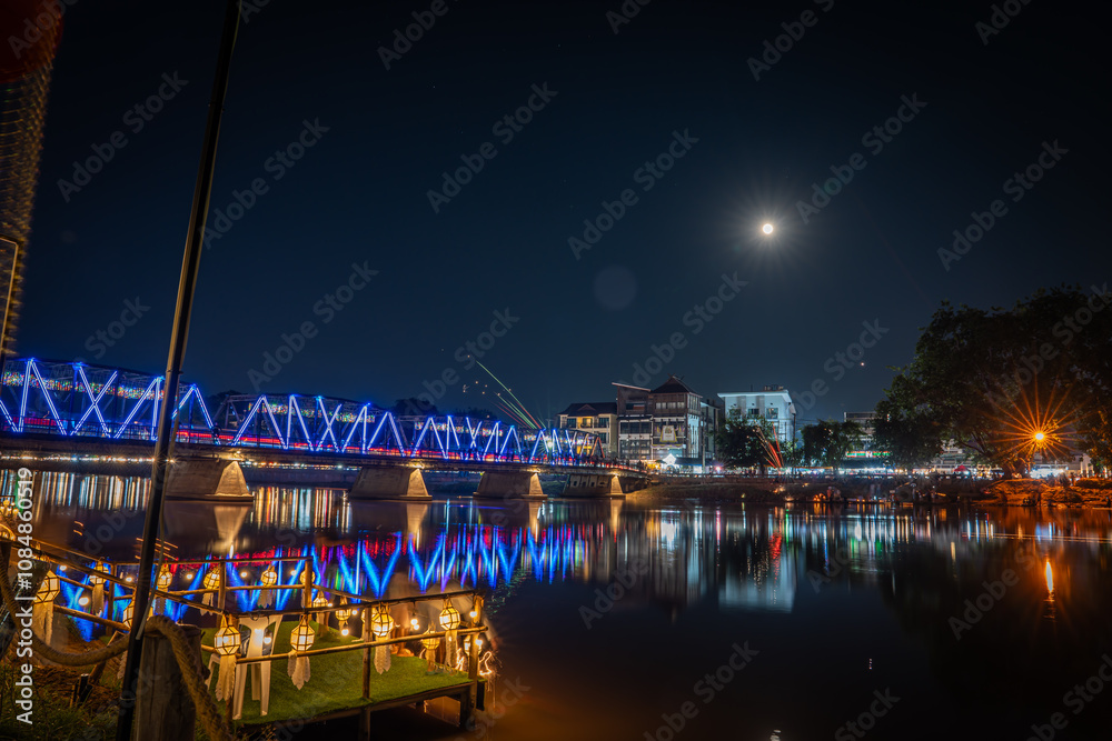 fireworks show at iron bridge across ping river where decorate with a ...