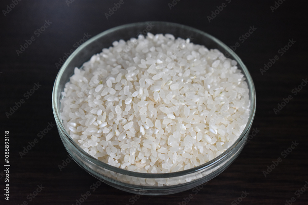 Plate with rice side view. Rice porridge in glass bowl isolated on ...