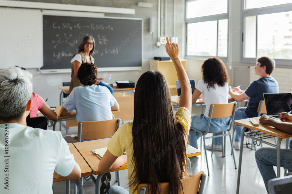 Foto Young group of gen z students attending class at high school. Rear ...