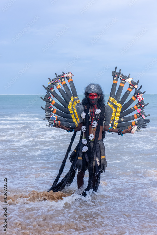 Kulasai Dasara, Portrait of indian male with painted face and dressed ...