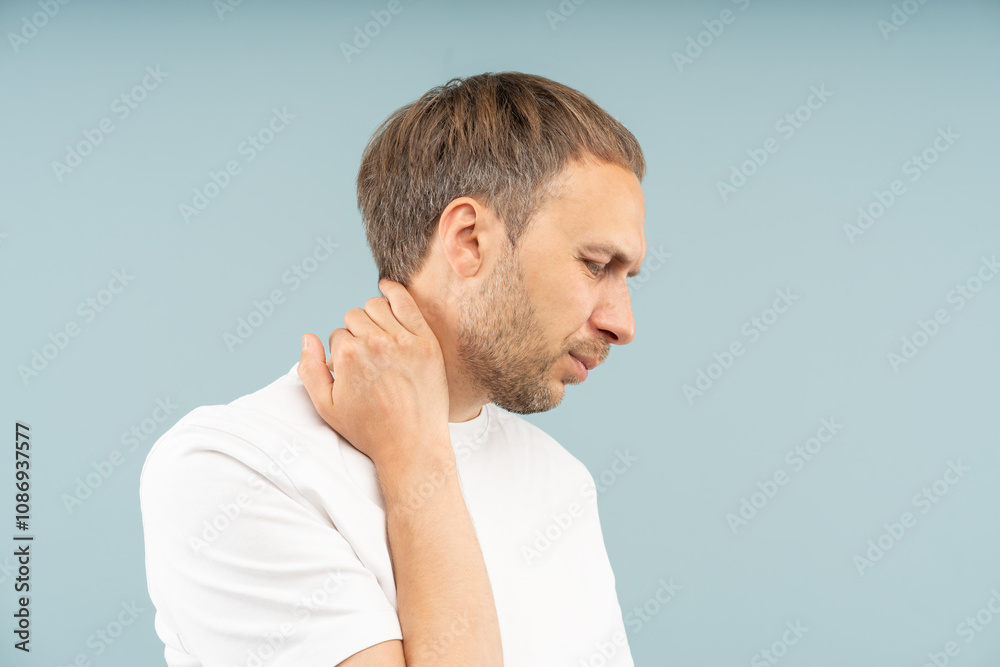 Unwell man endures intense neck pain, stiffness from bad posture ...