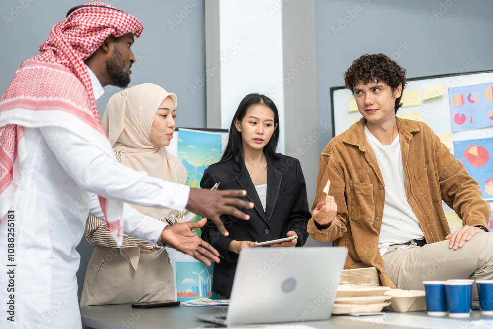 Diverse team professionals collaborating on sustainable development project during a corporate ...