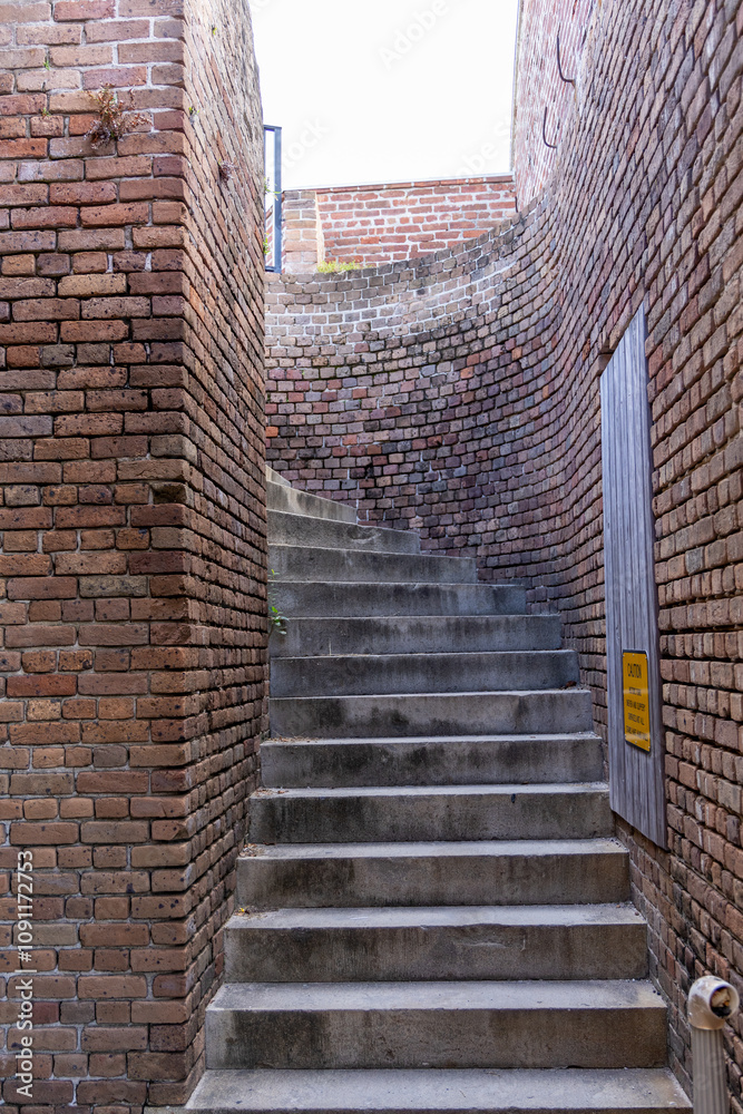 Historical brick fort with arched corridors, antique cannons, and ...