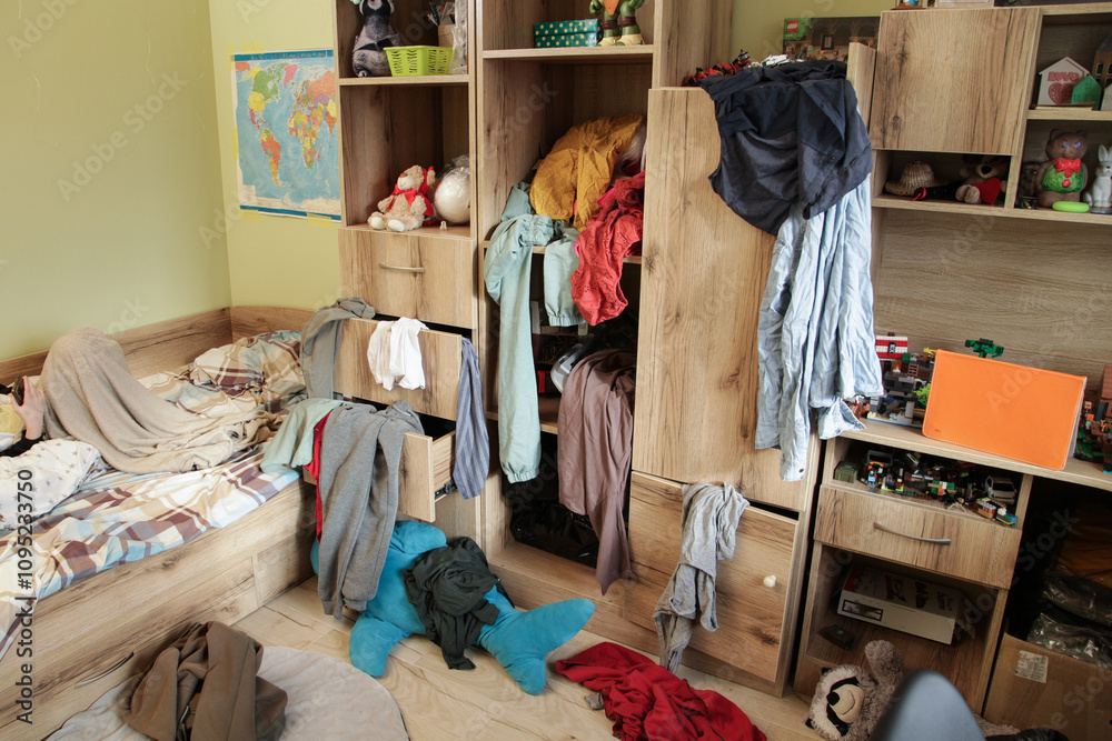 Scattered Things in Wardrobe, Disorder in Clothes. Childrens room is ...