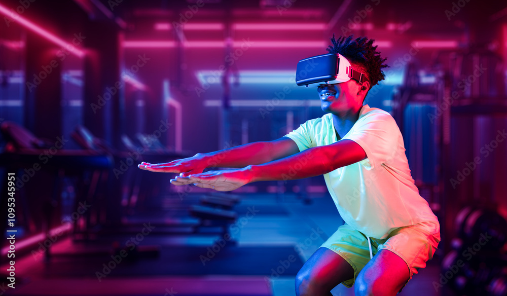 African man wearing shirt and VR headset while exercising at futuristic ...