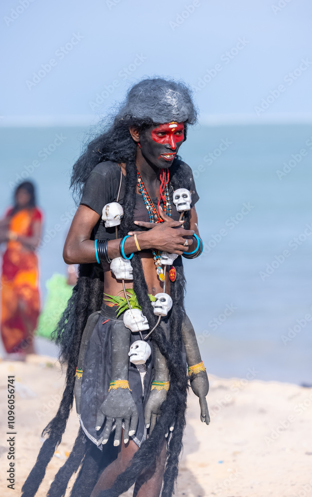 Kulasai Dasara, Portrait of indian male with painted face and dressed ...