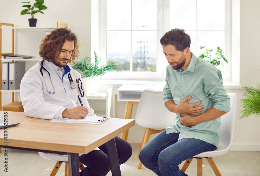Stock-Foto „Doctor gives consultation to young male patient suffering ...