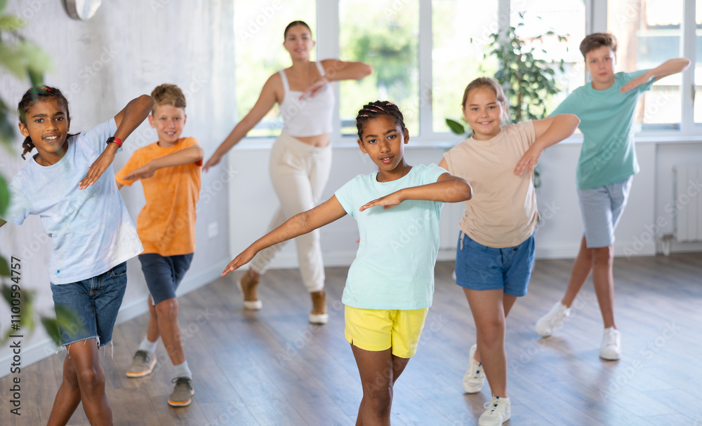 Smiling cute african american tween girl visiting group choreography ...