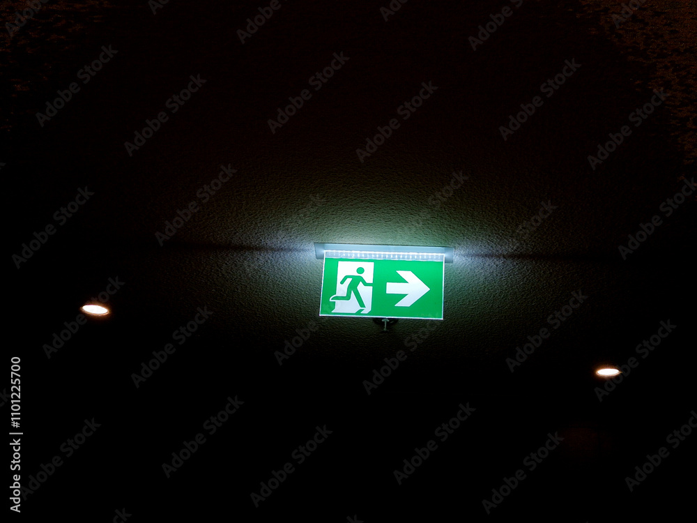 above the entrance to the toilet there is a light and an emergency exit ...