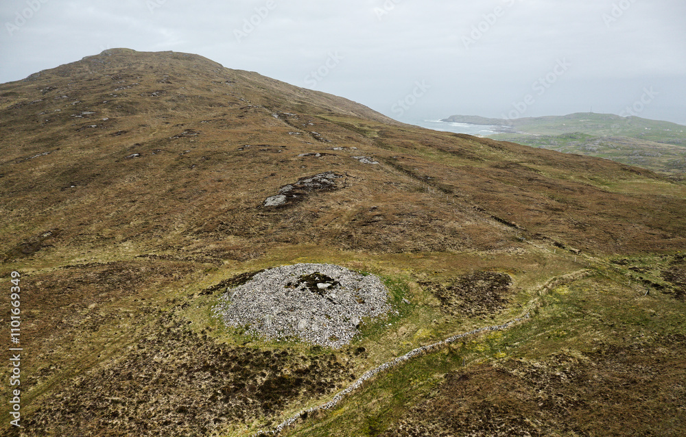 Dun Bharpa prehistoric Neolithic chambered cairn with peristalith stone ...
