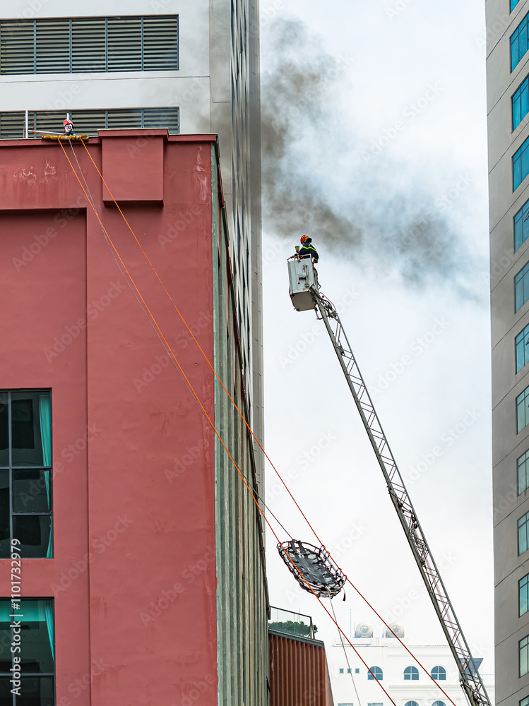 Fire and rescue drill in Nha Trang, Vietnam. Firefighters use different ...