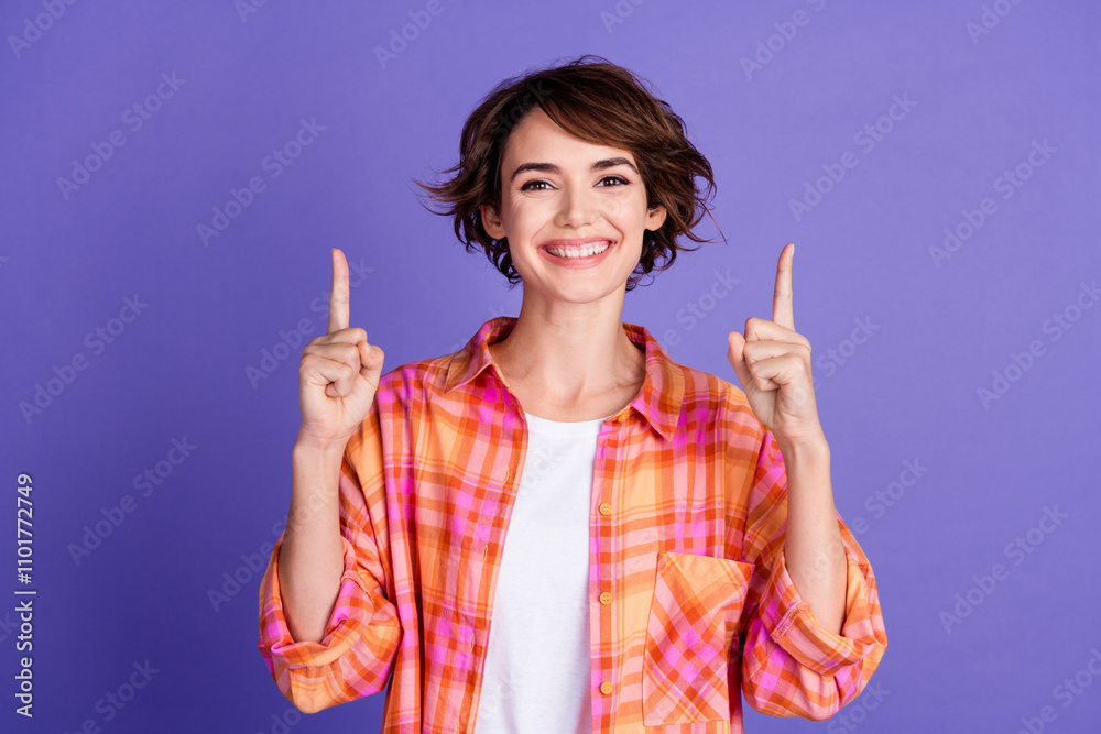Portrait of nice young lady point fingers up empty space wear shirt ...