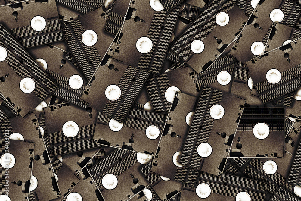 Stack of VHS tapes in sepia tones. Retro background with analog video ...