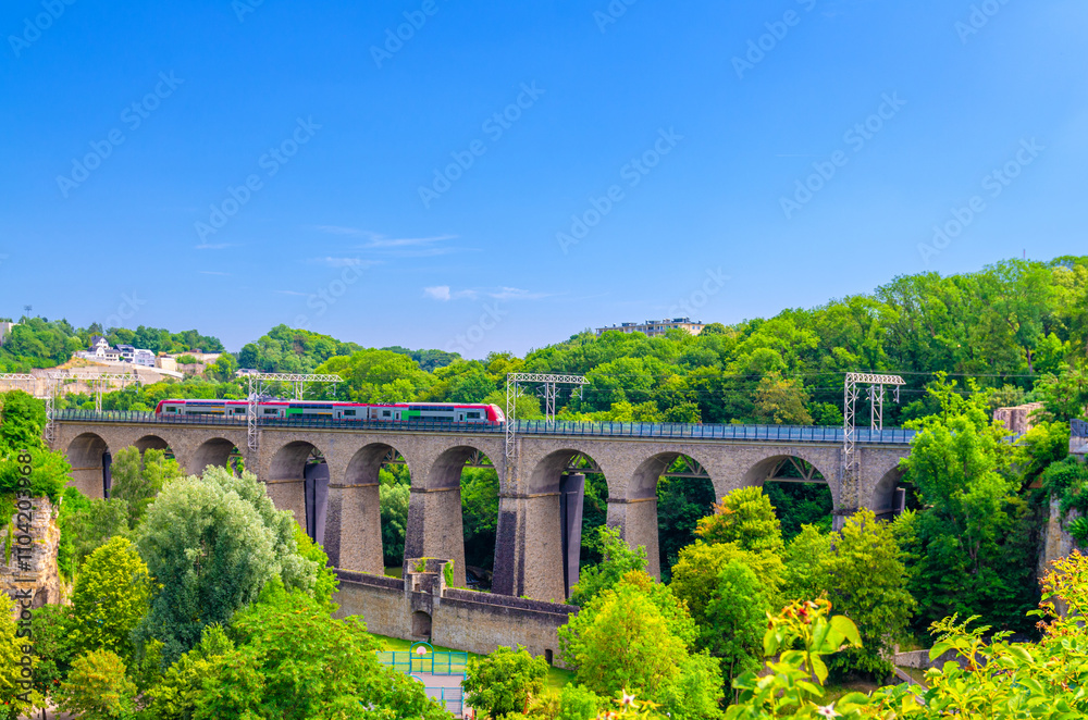 Train moving on viaduct bridge Pulvermuhl Viaduct Biisser Breck railway ...