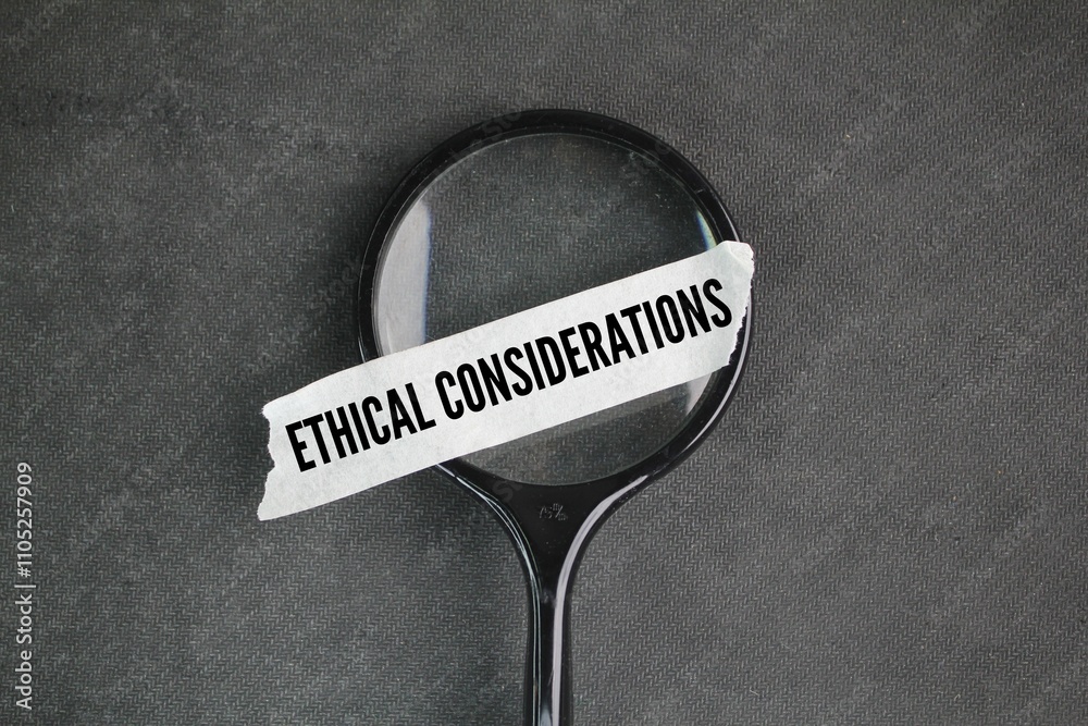 magnifying glass and a white sticker with the words Ethical ...