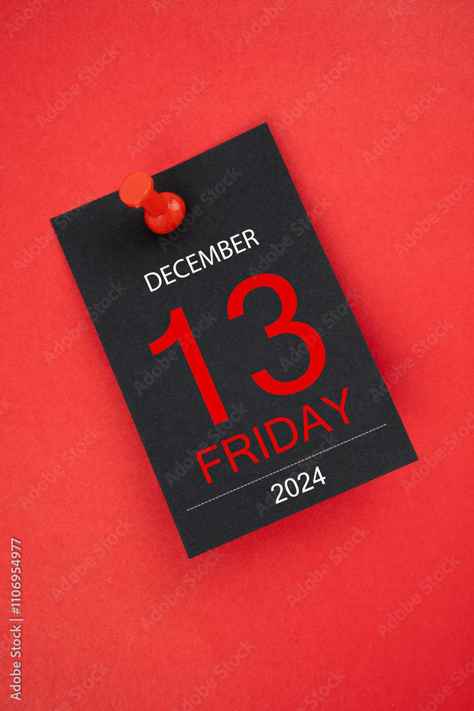 Calendar Friday the 13th December 2024 with push pin on red background ...