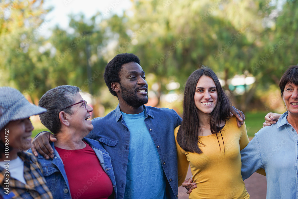 Group of happy multiracial people having fun hugging each other - Multi ...