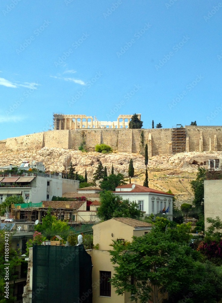The Acropolis stands as a symbol of ancient Greece, surrounded by ...