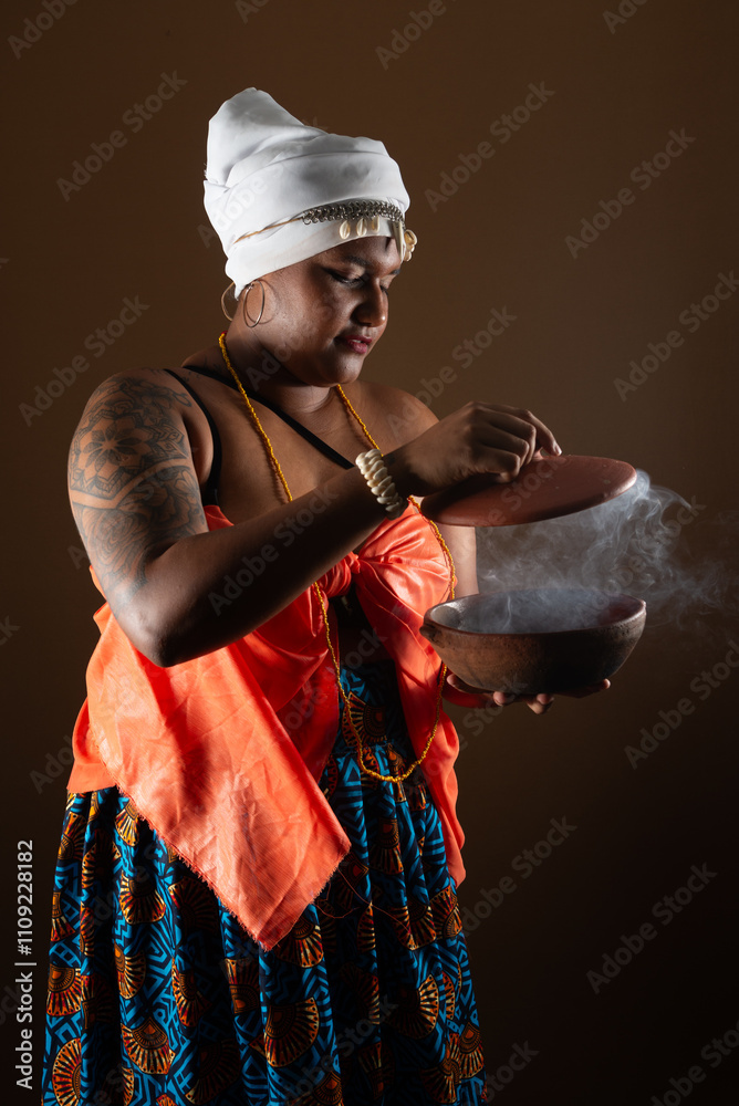 Beautiful woman in traditional Candomble clothing, opening clay pot ...