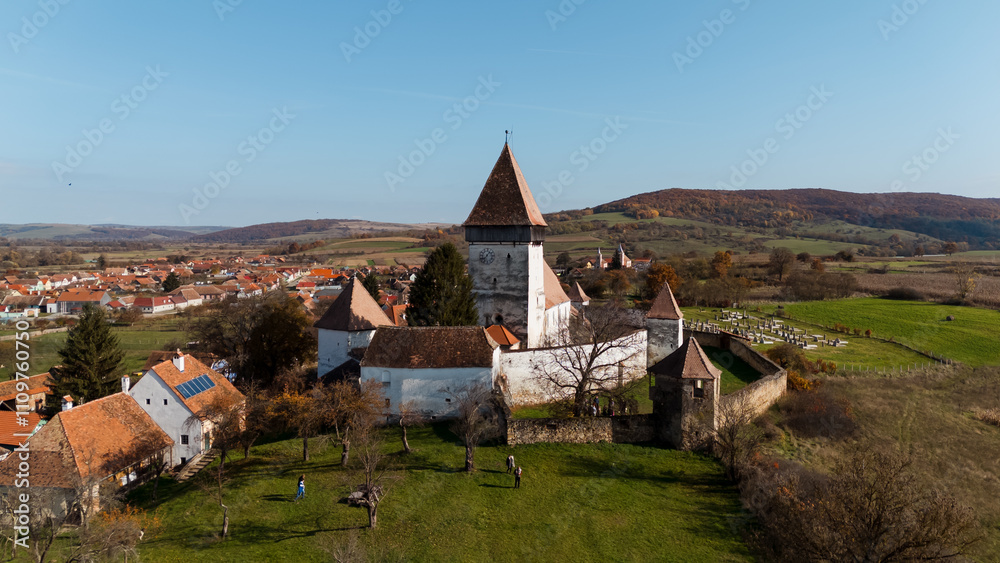 A stock photo of the Hosman Fortified Church in Romania captures the ...
