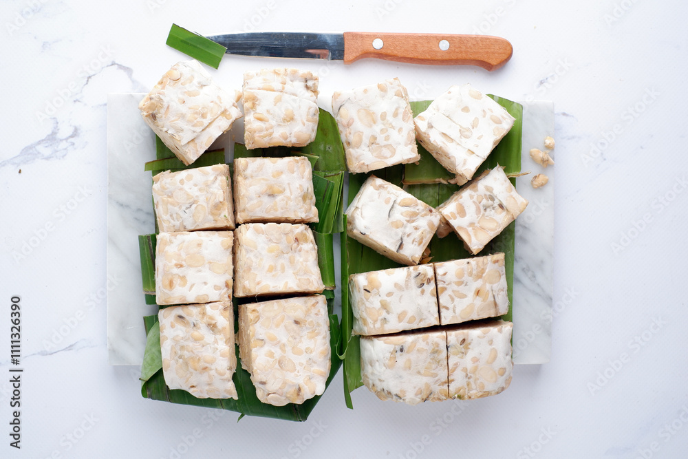 Tempe is a traditional Indonesian food made from fermented soybeans. It ...