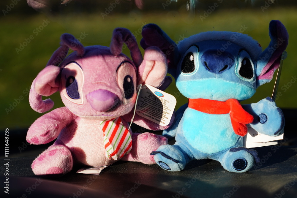 Stuffed animal toys of Angel and Stitch from Lilo and Stitch cartoon ...