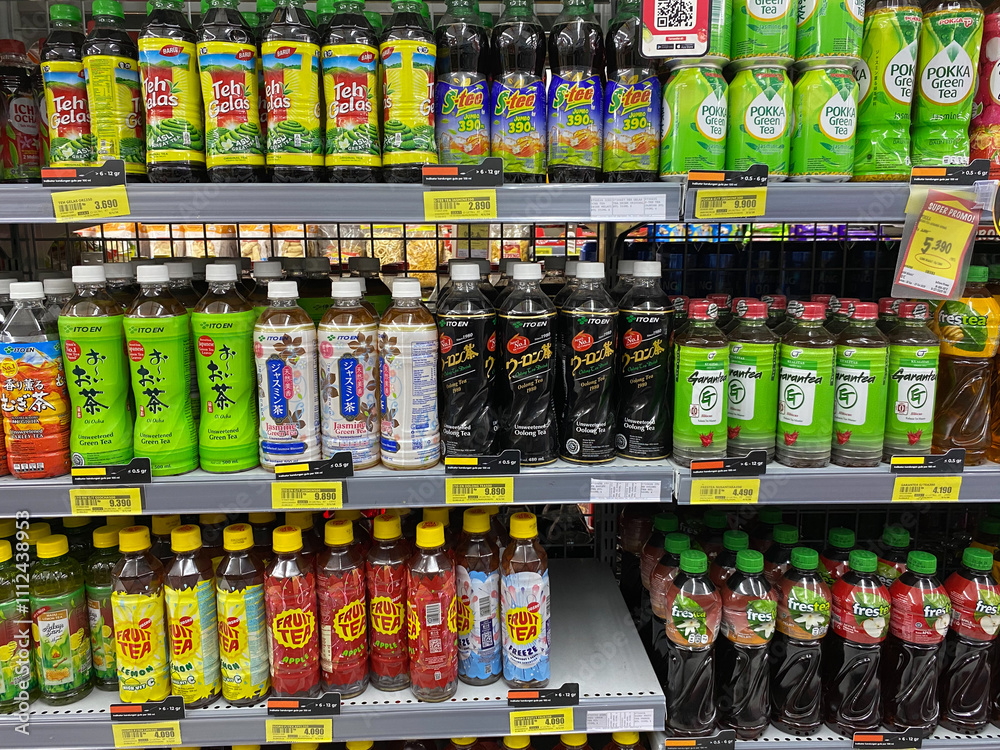 Various bottled tea brands at Indonesia, displayed on supermarket shelf ...