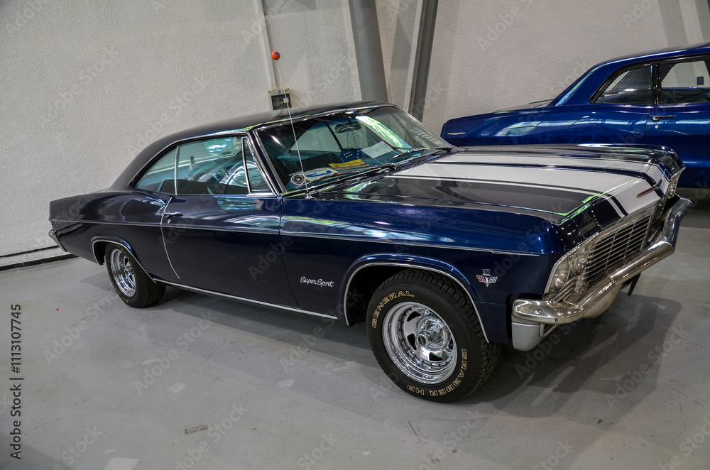 1966 Chevrolet Impala, an iconic American classic known for its bold ...