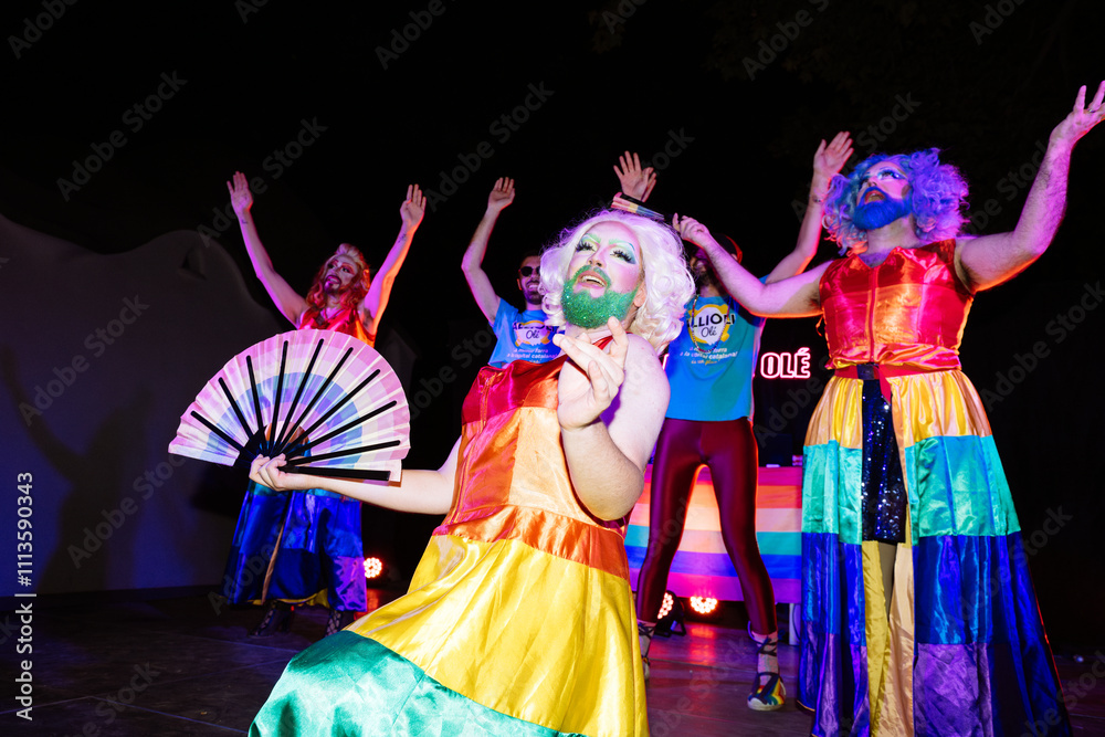 Drag Queens Perform in Vibrant Pride-Themed Costumes at a Lively Event ...