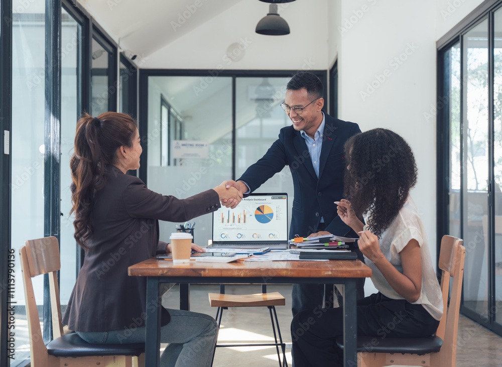 Successful Business Partnership: A handshake seals a deal between a ...