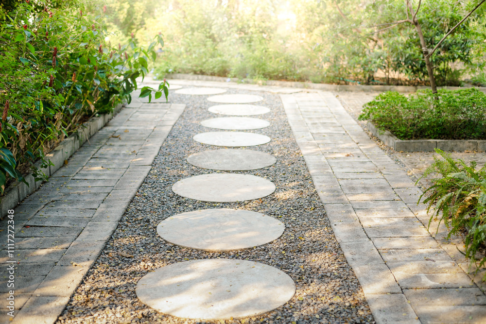 Walkway and bush in garden. Also called concrete pavement, floor ...