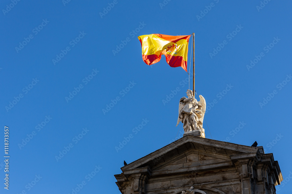 Archangel Michael statue holding Spanish National Flag, above the main ...
