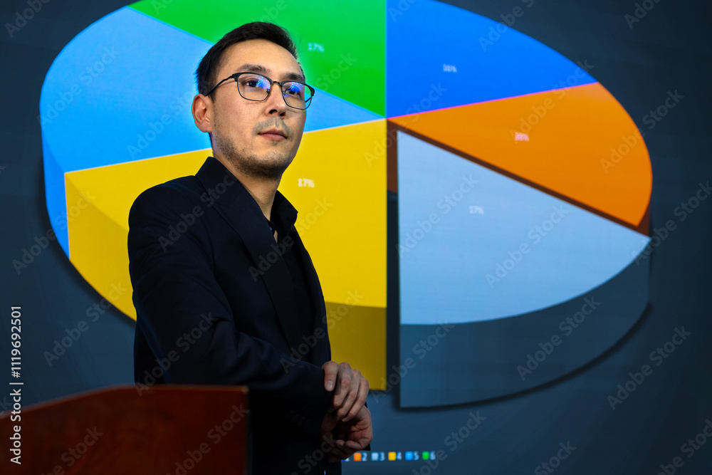 Confident banking employee delivering presentation, standing near ...