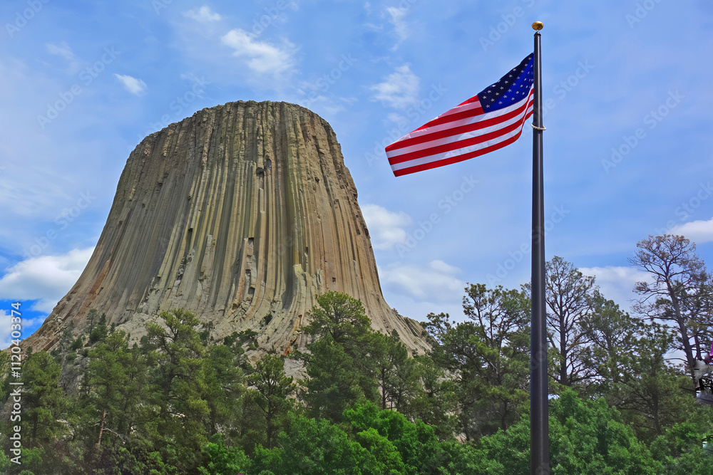 Devils Tower and American Flag - A laccolithic butte composed of ...