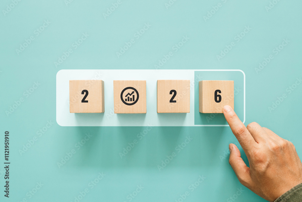 New year 2026 countdown, goal planning, Loading year 2026. Hand putting ...