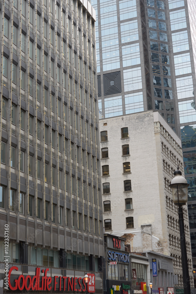 old and new buildings facing Yonge St (GoodLife Fitness, a gym, located ...