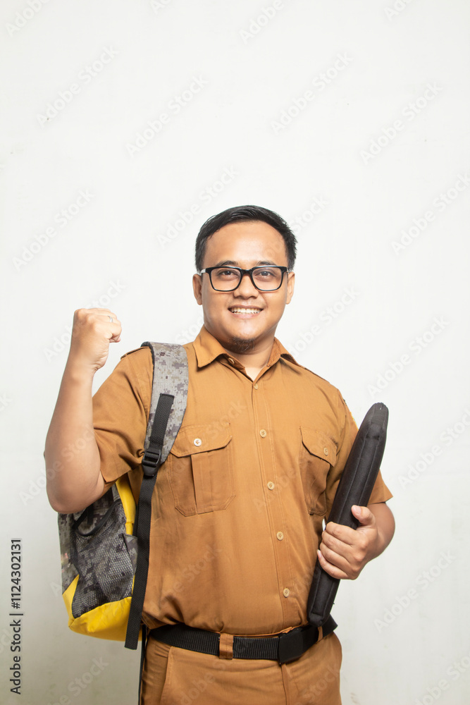 enthusiastic male employee ready to work wearing khaki uniform and ...