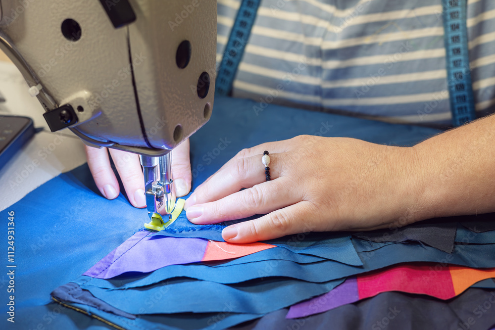 The process of sewing clothes from the remains of textiles and cut ...