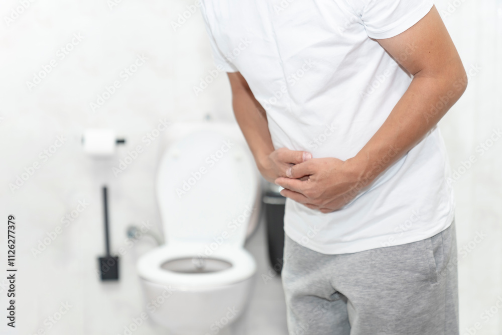 Men have stomachache and use their hands to hold their stomach In the ...