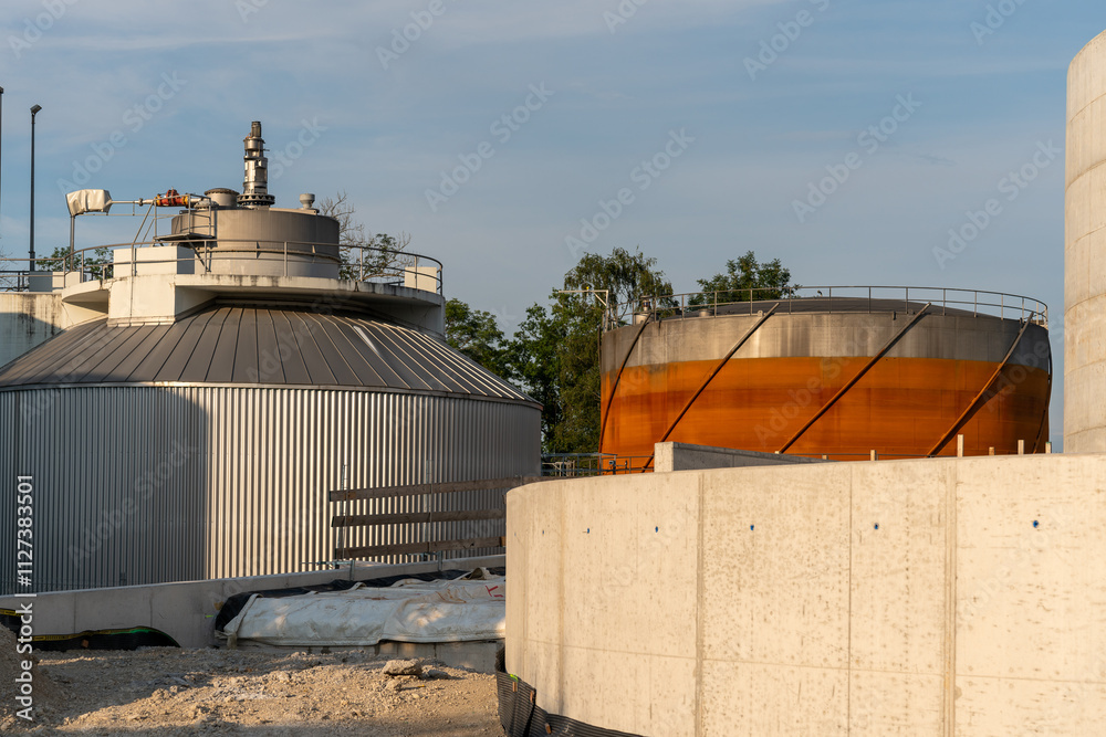 Natural biogas storage under a blue and lightly clouded sky. Biogas ...